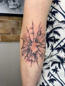 18 Broken Glass Tattoo with a Bold Edge - TattoosOfAsia