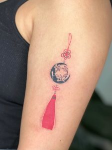 17 Delicate and Beautiful Small Charm Tattoos - TattoosOfAsia