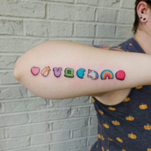 17 Delicate and Beautiful Small Charm Tattoos - TattoosOfAsia