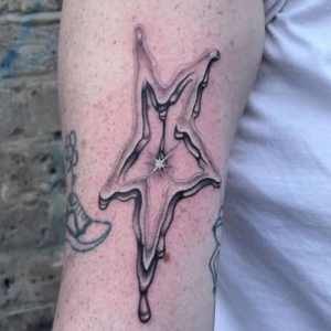 15 Melting Tattoos for Lovers of Weird, Wicked Art - TattoosOfAsia