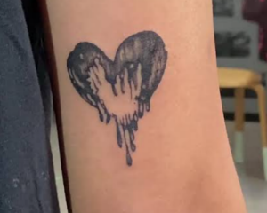 15 Melting Tattoos for Lovers of Weird, Wicked Art - TattoosOfAsia